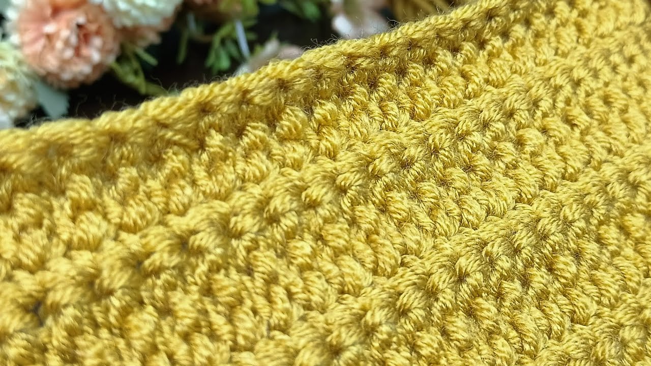 Continue to knit the knitting pattern dominated by mustard color # ...