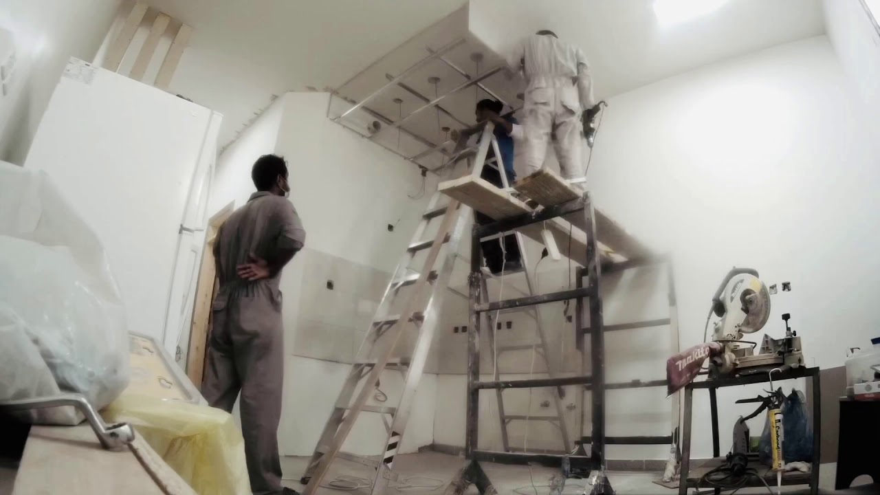 Installing gypsum board on ceiling... - YouTube