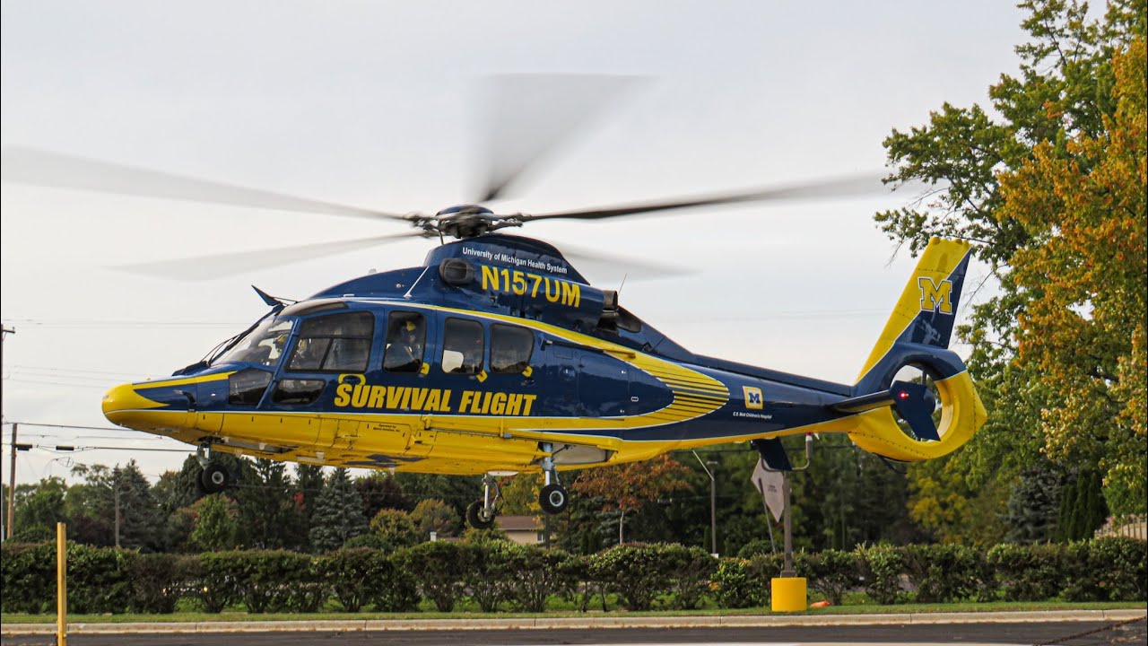 U OF M SURVIVALFLIGHT 2 (N157UM) AIRBUS H155 B1 LIFTING FROM MCLAREN ...