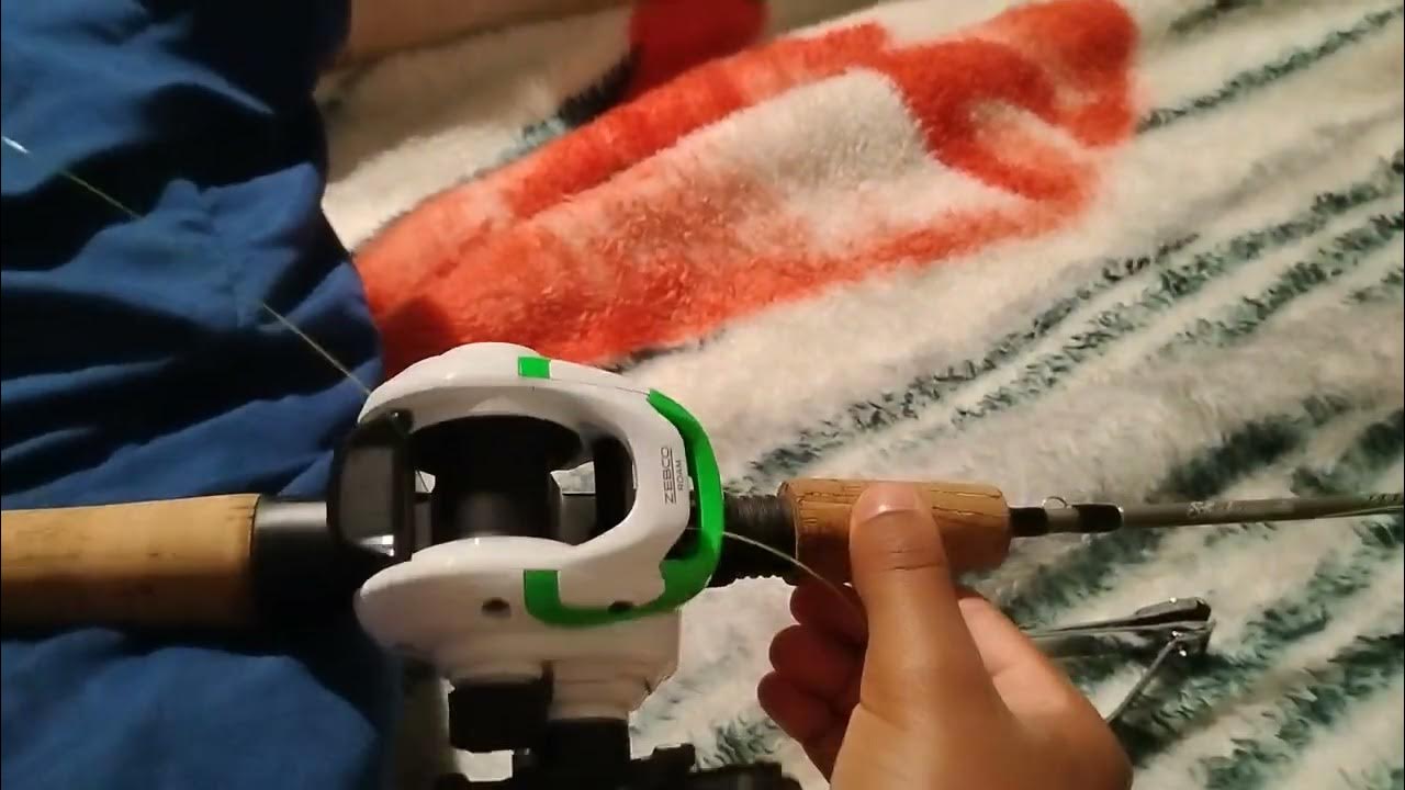 how to spool a baitcaster with line - YouTube