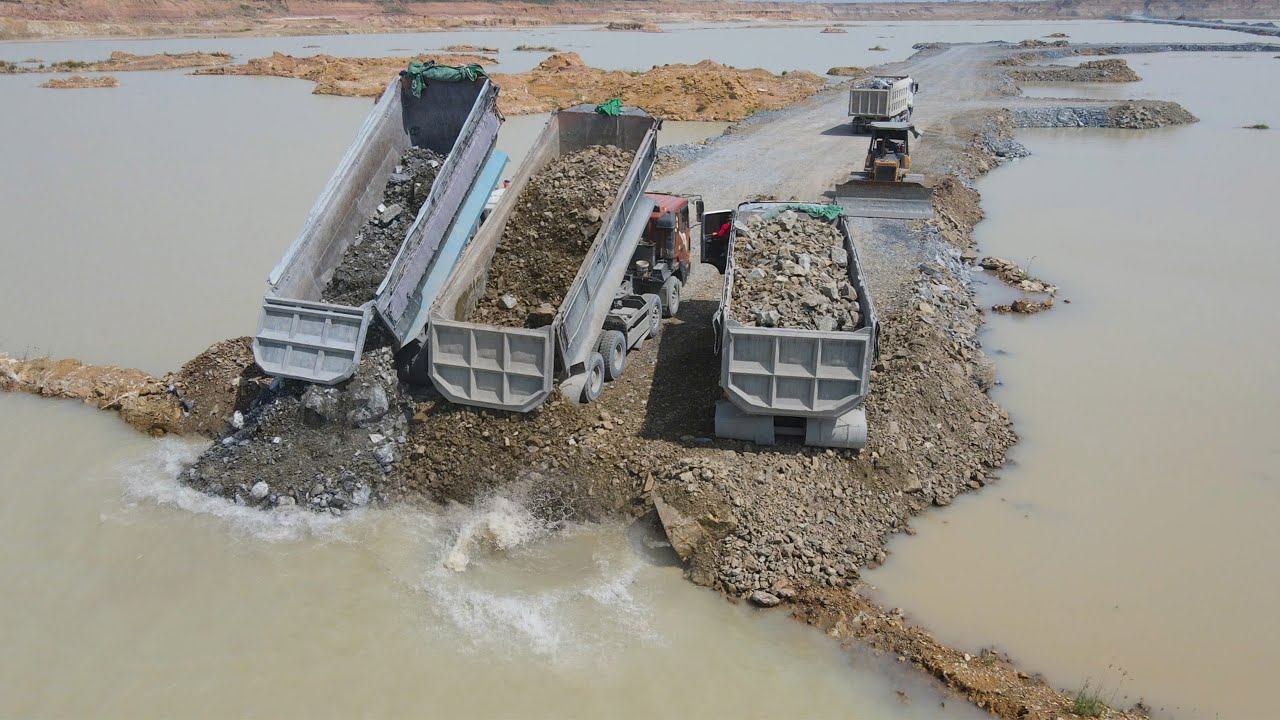 Wonderful Building Road On Water Construction By Bulldozer Pushing ...