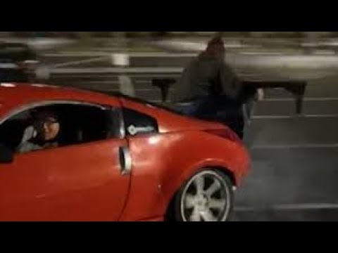 Man falls taking 350 car spoiler off the vehicle. - YouTube