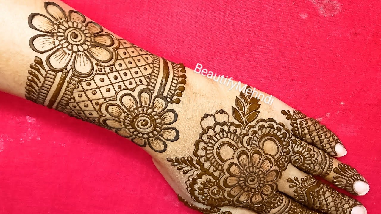 Simple and Easy Mehndi Designs for Back Hand / cone designs simple ...