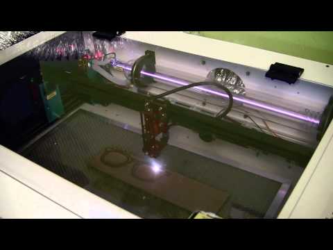 5th Gen Hobby FSL laser cutter doing its thing - YouTube