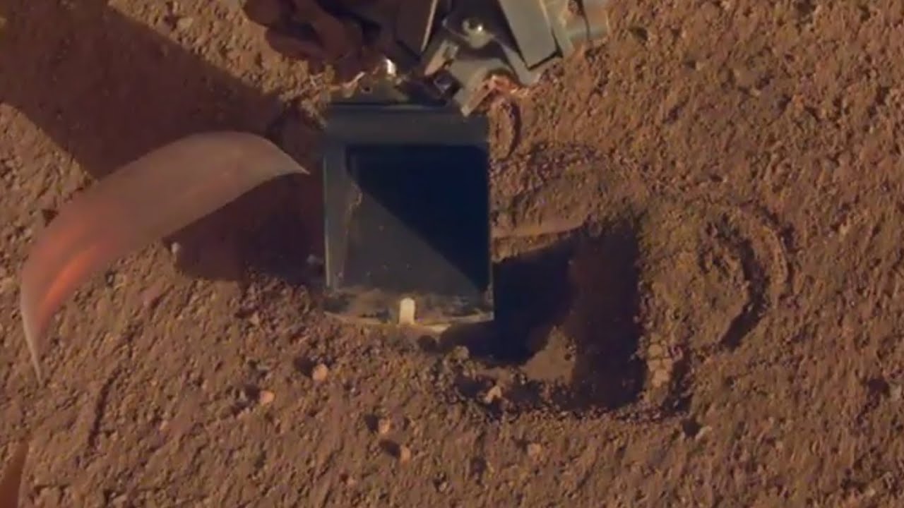 NASA’s InSight Lander Finally Burrows ‘Mole’ Into Martian Surface - YouTube