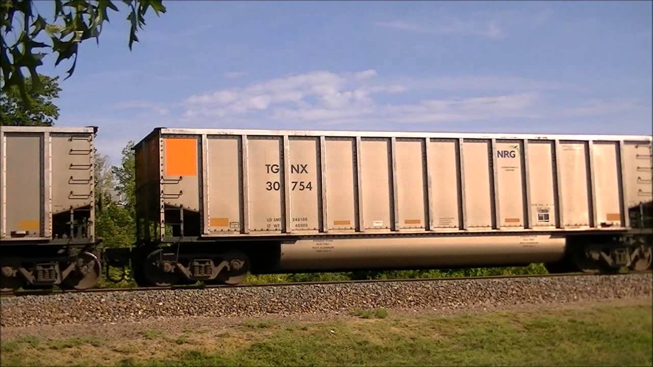 NB BNSF 5889 leads solo with two EMD's as the DPU's on the Ft. Scott Sub Merriam KS - YouTube