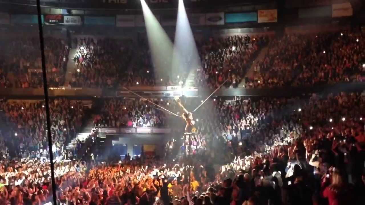 Pink flying through the air signing "So What", from "The Truth About ...