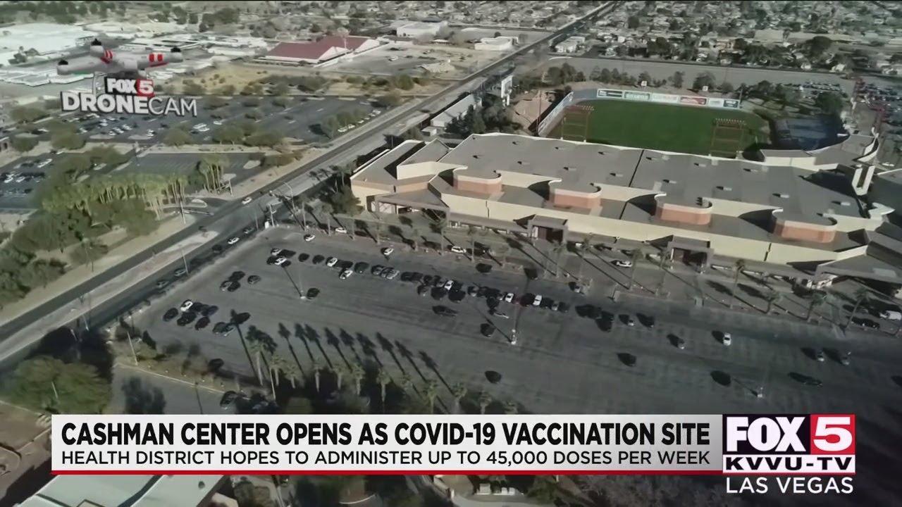 Line for COVID-19 vaccine forms outside of Cashman Center in Las Vegas ...