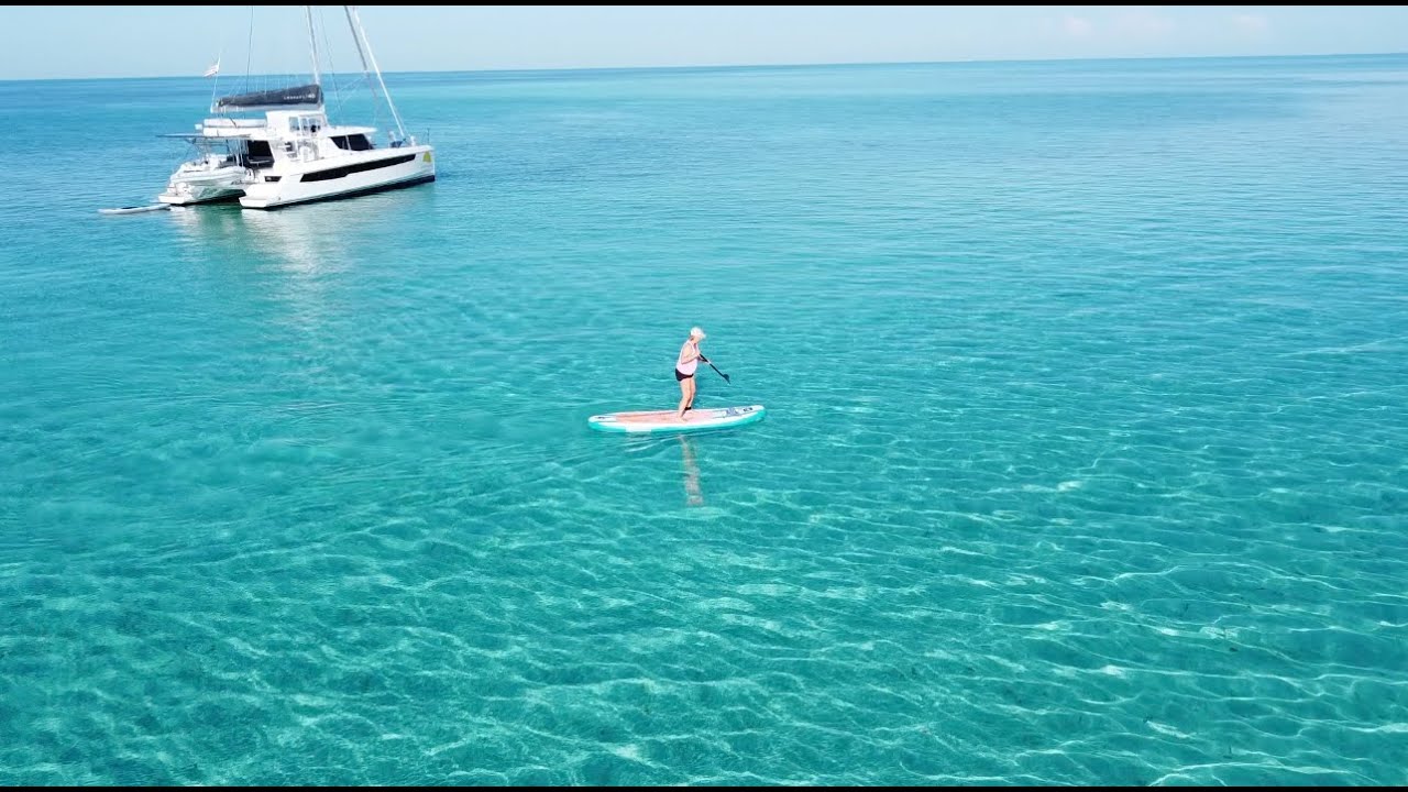 Jen paddle boarding in the Berry Islands, Bahamas - YouTube