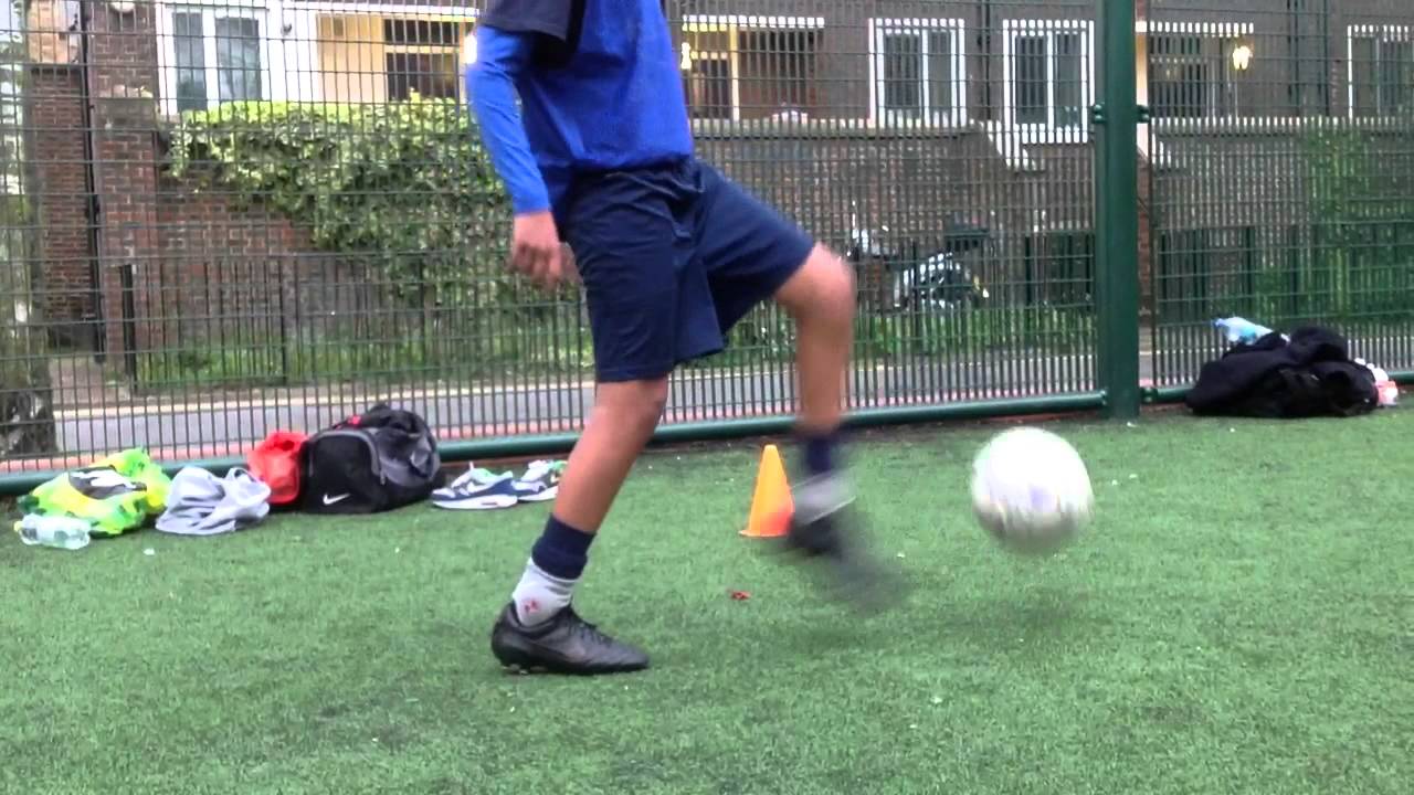 Daniel attempting to do kick ups - YouTube