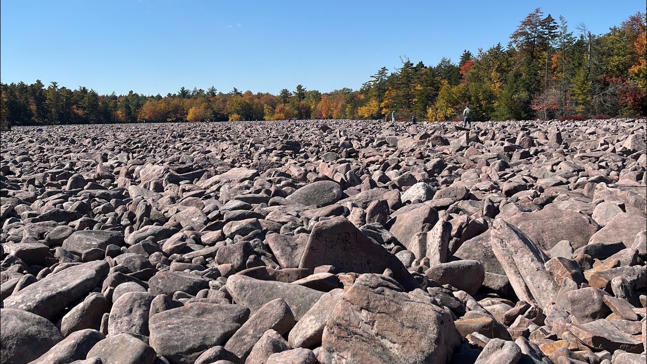 Climbing through a rock wasteland - YouTube