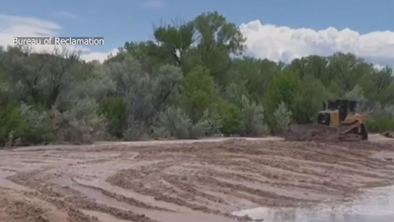 Crews work to clear sediment plug in Rio Chama - YouTube