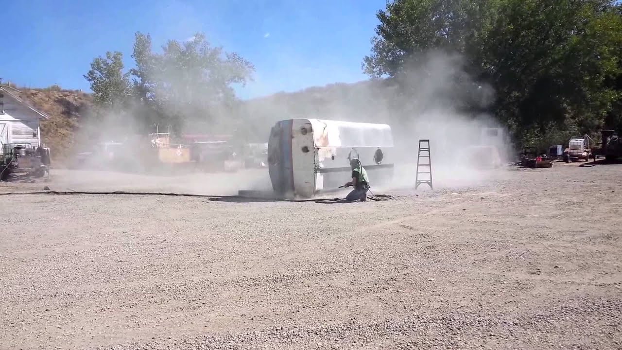 Sandblasting a tank - YouTube