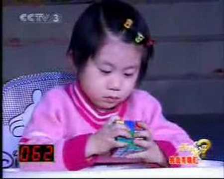 3 years girl playing cube in a TV show - YouTube
