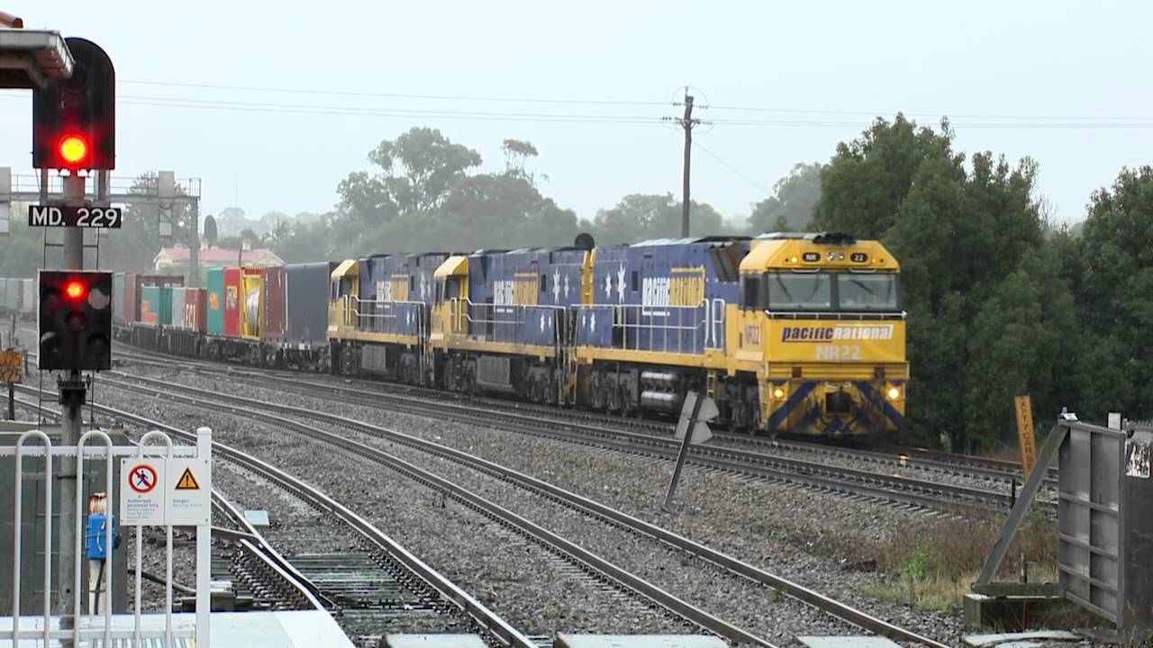 Long freight train arrives at Maitland in the rain - Railroads and ...