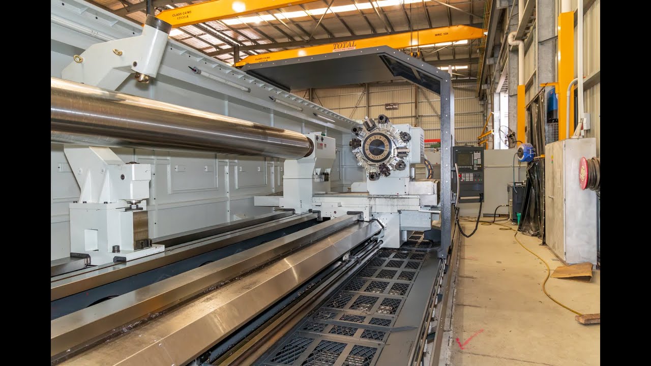 Flat Bed CNC Turning Center - YouTube
