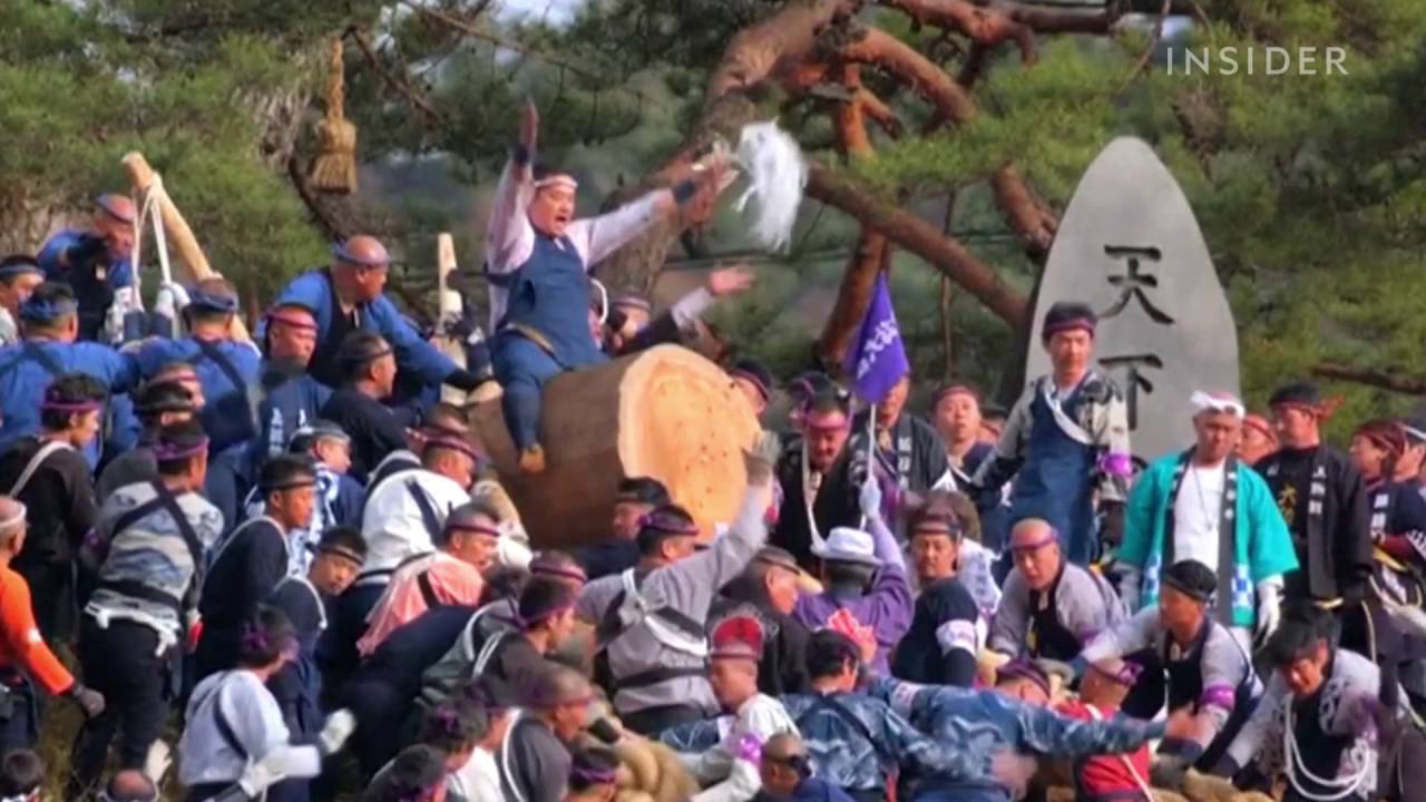 Watch these men ride a 20,000 lb. log down a hill - YouTube