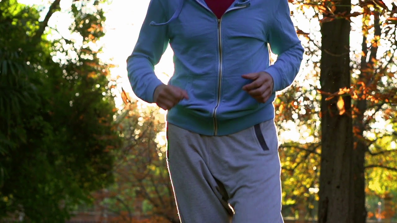 man running in the sunlight slow motion shot at 240fps steadycam shot ...