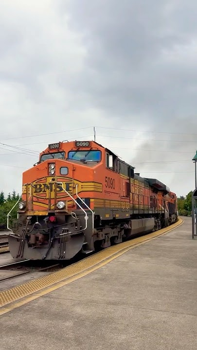 BNSF dash 9 grain train passing by - YouTube