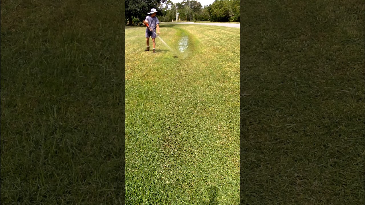 Super Fast String Trimming a Wet Swale - YouTube