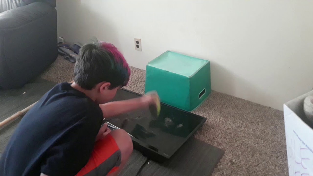 Destroying a tv - YouTube