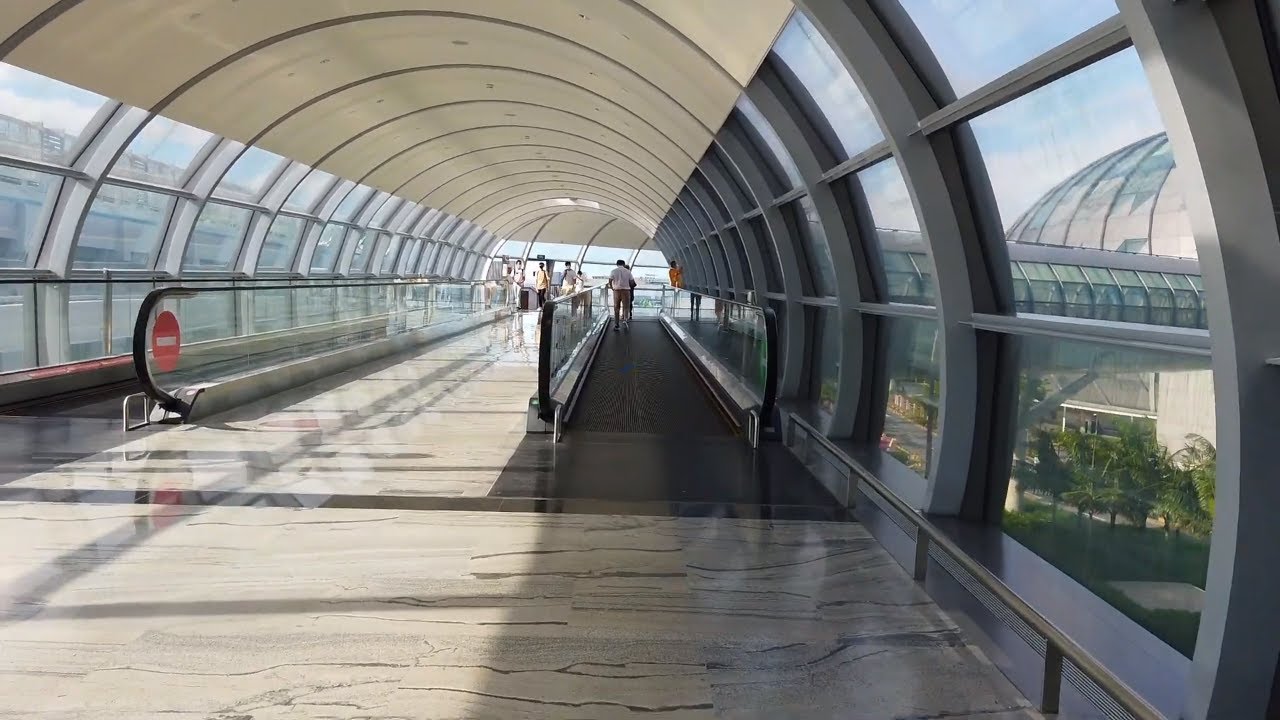 Walking to Jewel Changi Airport Link Bridge on Travelators - YouTube
