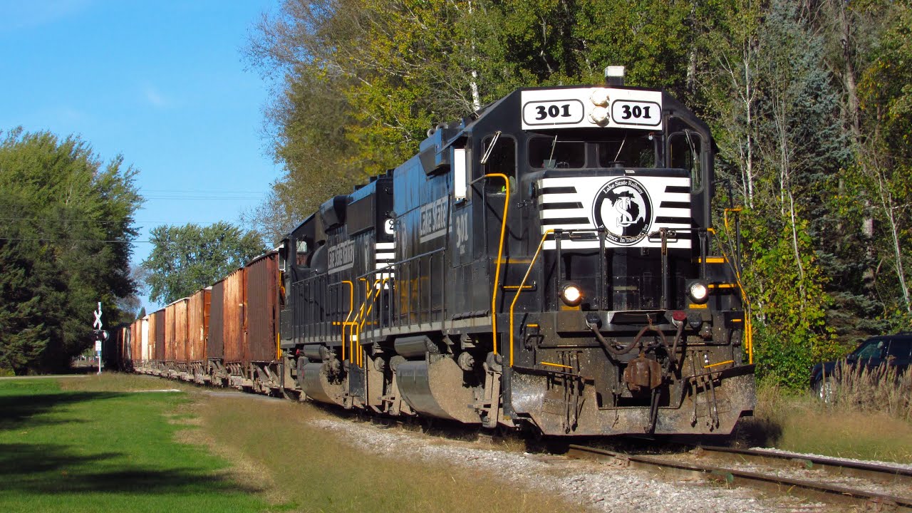 Lake State Railway Train 326 rocks on by with LSRC 301 and LSRC 4301 ...