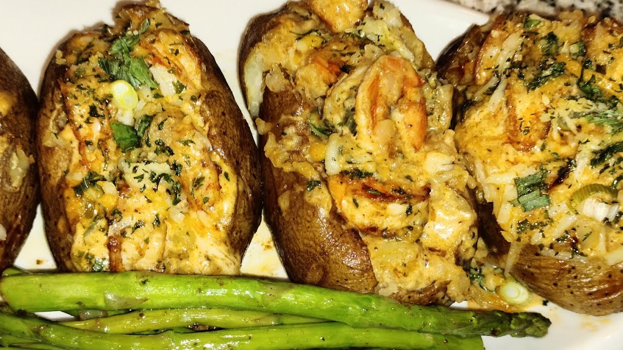 Overstuffed baked potatoes with shrimp and dairy free cream sauce. # ...