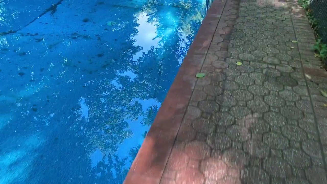 Discolored pavingstones worn out around pool - YouTube