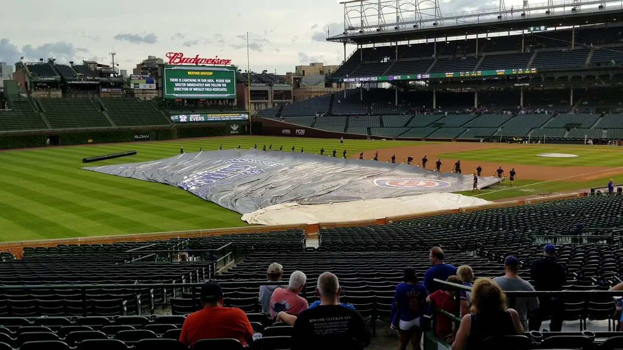 08-28-18 Cubs v. Mets game; emptying the rain tarp at Wrigley Field ...