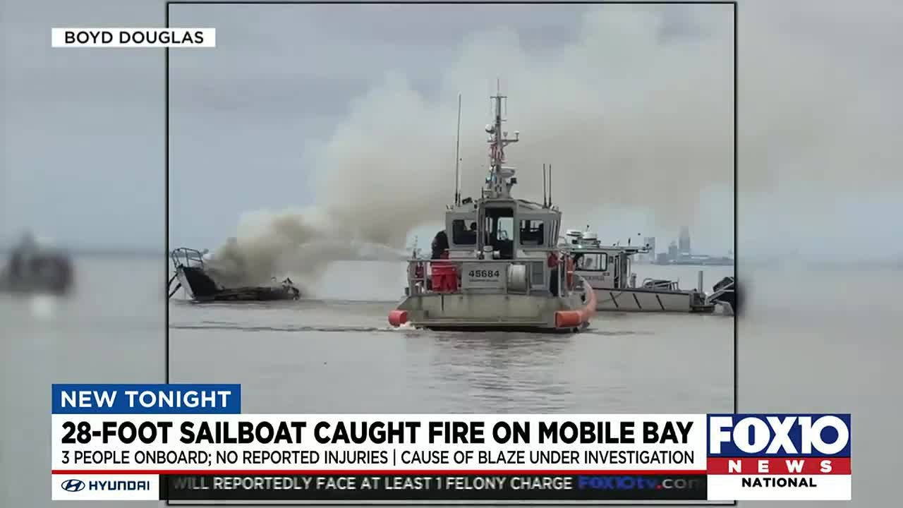 Crew rescued after sailboat catches fire in Mobile Bay - YouTube