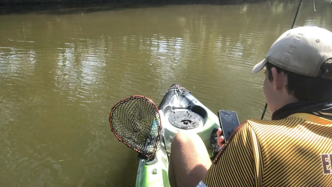 Wild Bass fishing in spring | skinny river fishing in the yak - YouTube