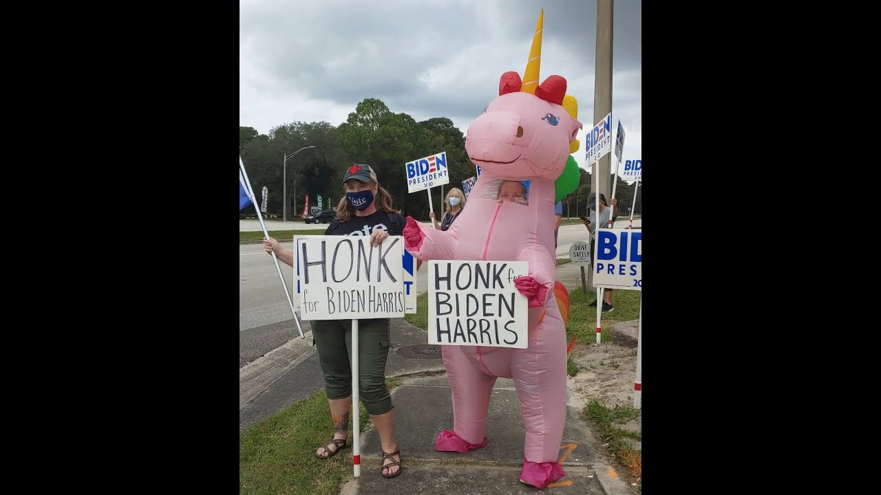 Sign waving at San Pablo & Atlantic Blvd! - YouTube