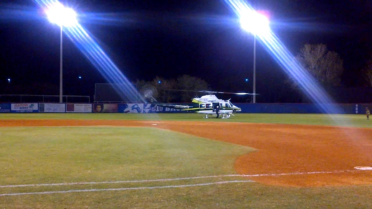 Helicopter lands on STU Baseball field - YouTube