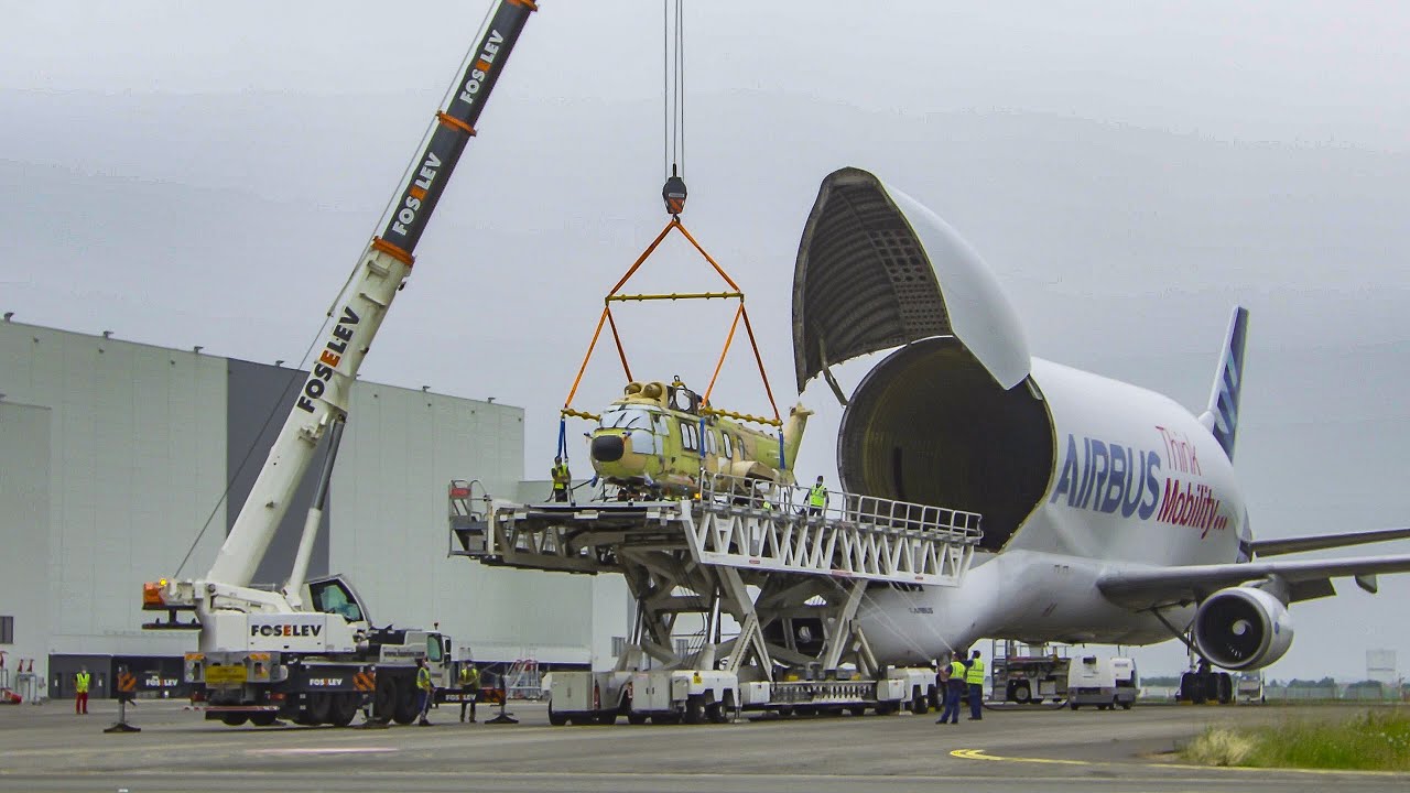 loading a Super Puma helicopter on Beluga Airbus Super Transporter ...