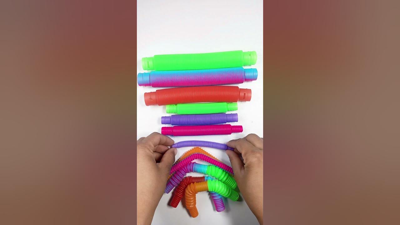 Pop tube's changing colors by stretching #stretching #colorfulpoptube # ...