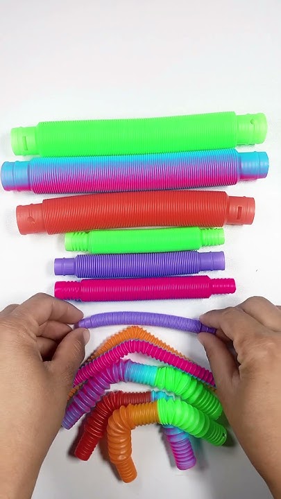 Pop tube's changing colors by stretching #stretching #colorfulpoptube # ...