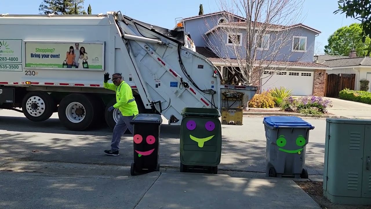 Green Waste Garbage Truck Picking up Smiley Face Garbage Can. Garbage ...