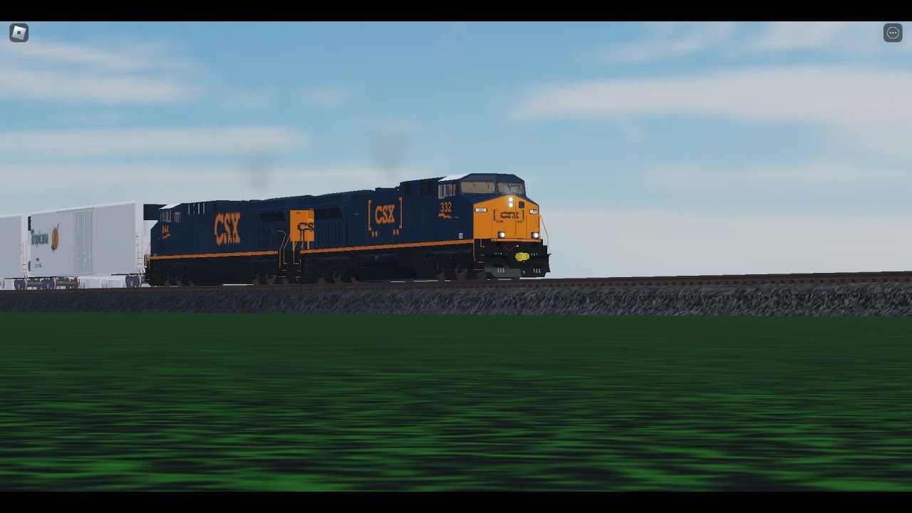 CSX Reefer train passes threw Sunrail overpass - YouTube