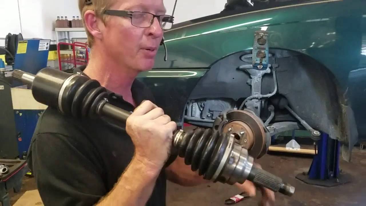 2002 mitsubishi lancer Left Front CV Axle replacement - YouTube
