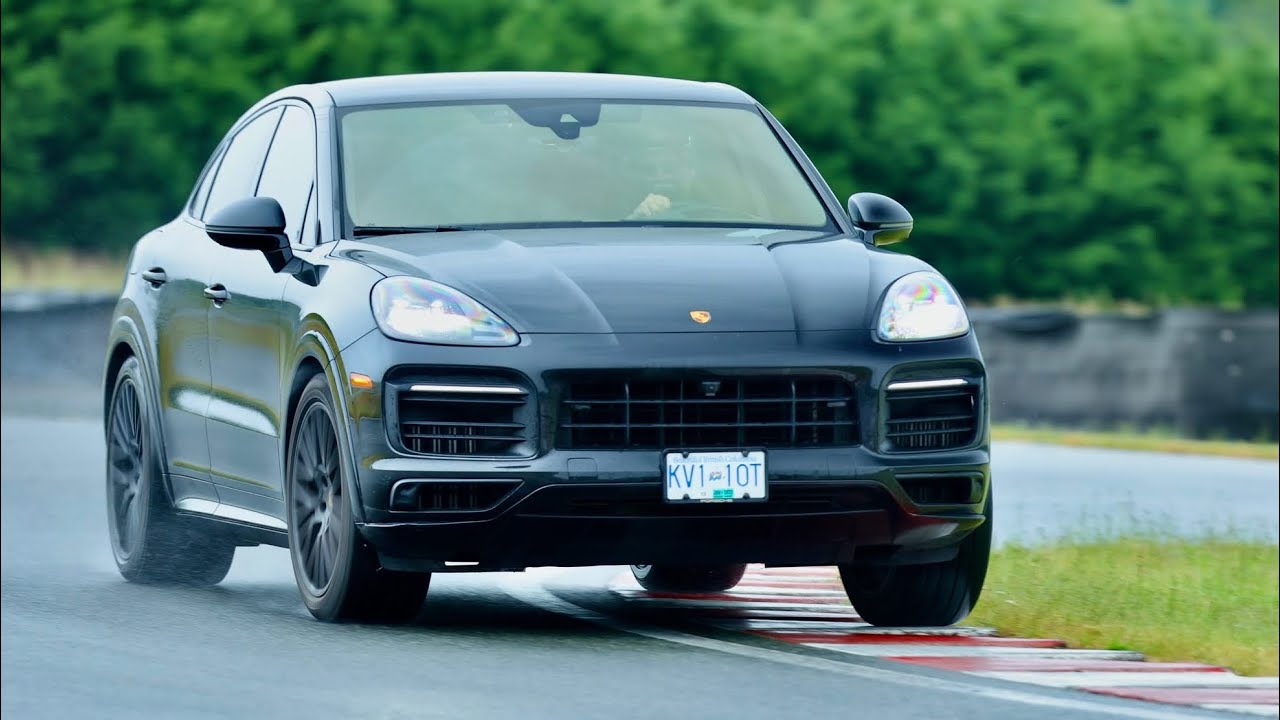 VIMC - 5,000lbs SUV on track in the wet - YouTube