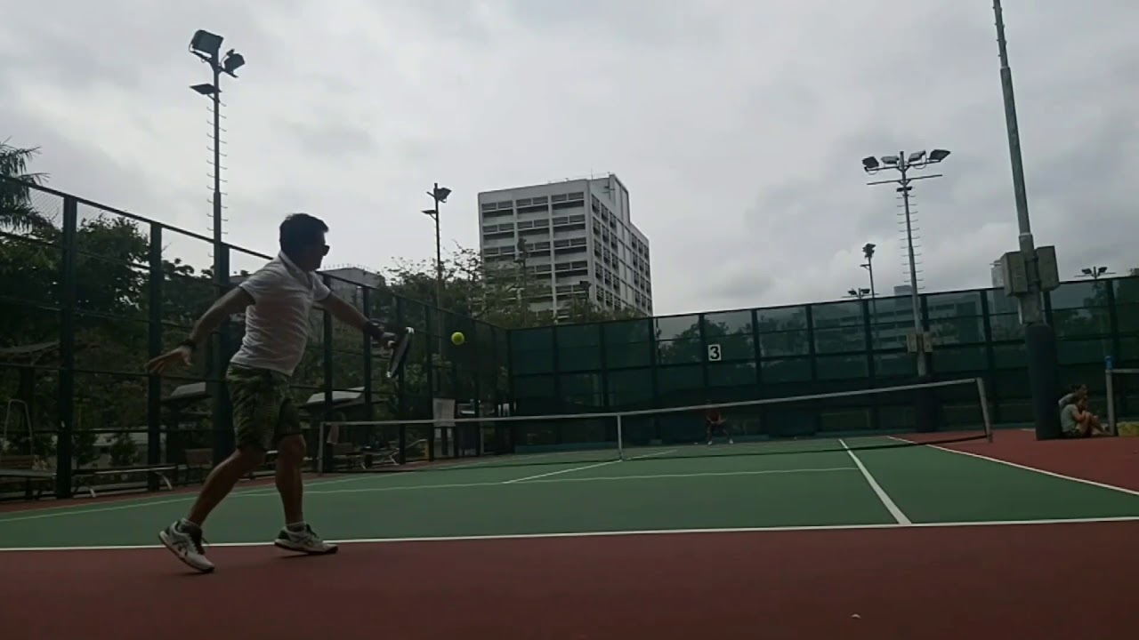 Hitting tennis ball in slow motion. - YouTube