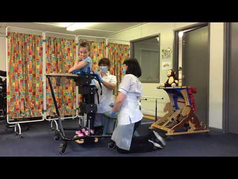Removing a child from an Upright Standing Frame to a chair - YouTube