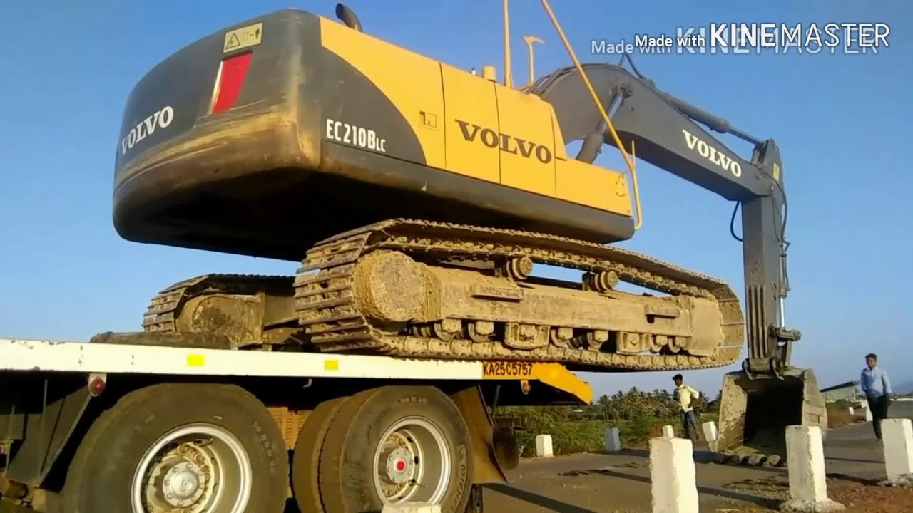 Volvo 210 blc machine loading tryli - YouTube