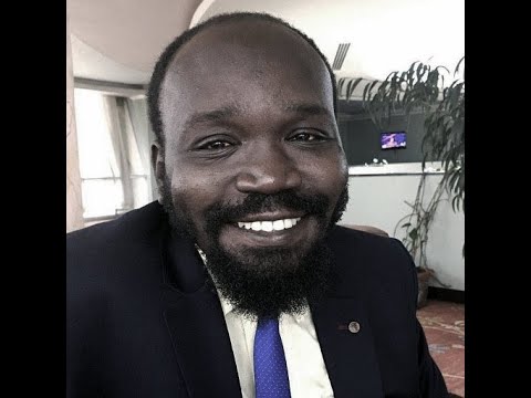 Hon. Peter Mayen Majongdit, speaking to (Umbrella Story Rally) program ...