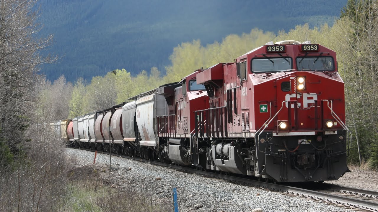 Huge Train!!!! CP 9353 and CP 8021 Lead CP 401 West at Canmore, Alberta - YouTube