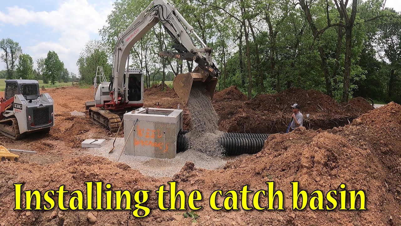 Setting The Catch Basin And Pipes At The Retention Pond Job - YouTube