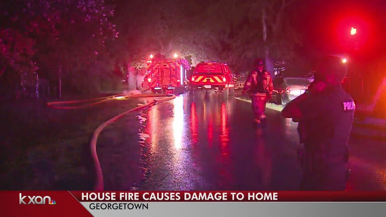 House fire in Georgetown displaces three people - YouTube