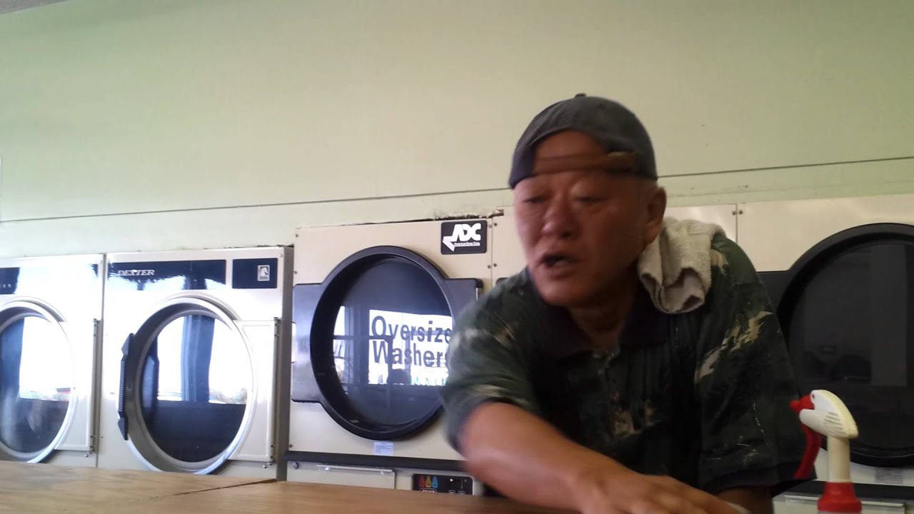 Toothless Chinese man at laundry mat - YouTube