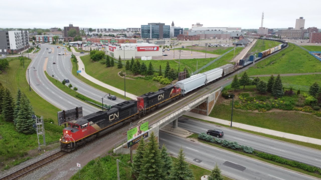 Awesome Aerial 4K View! Two SD70M-2s Lead Manifest Train CN 507 into ...